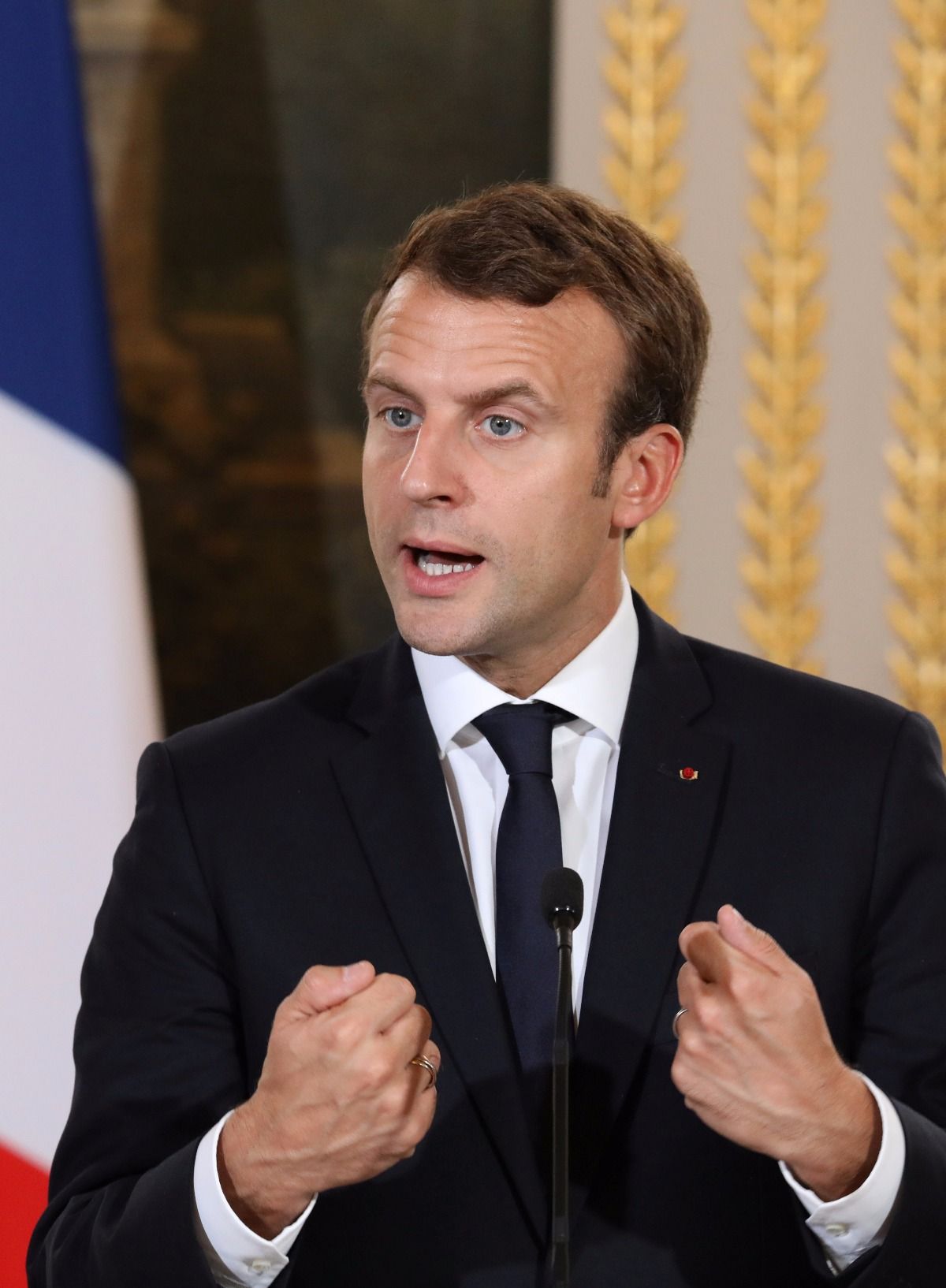 Macron's tighter asylum rules worry own party