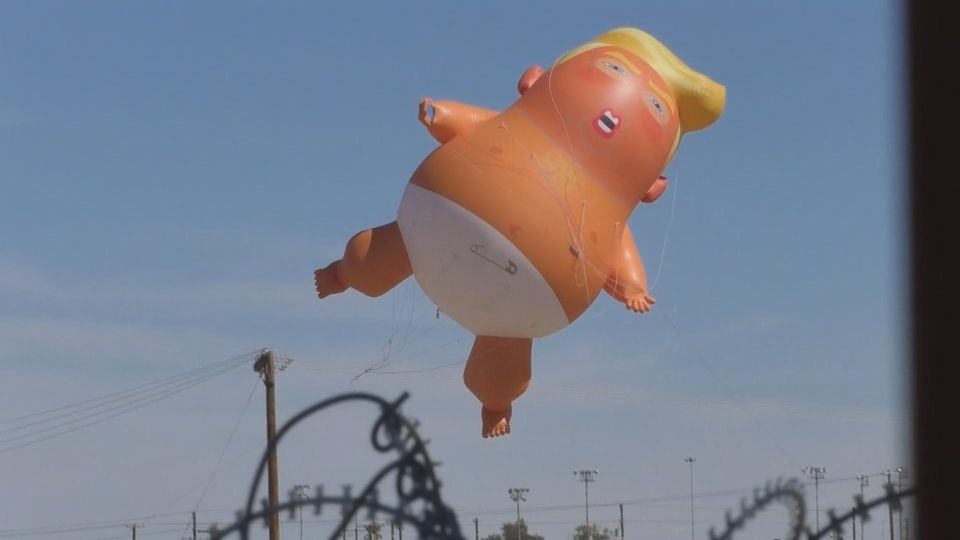 Big, fat high-flying Trump baby awaits Trump at border | Reuters