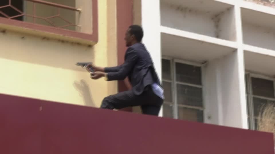 Gunfight and siege in Kenya as police foil bank robbery | Reuters