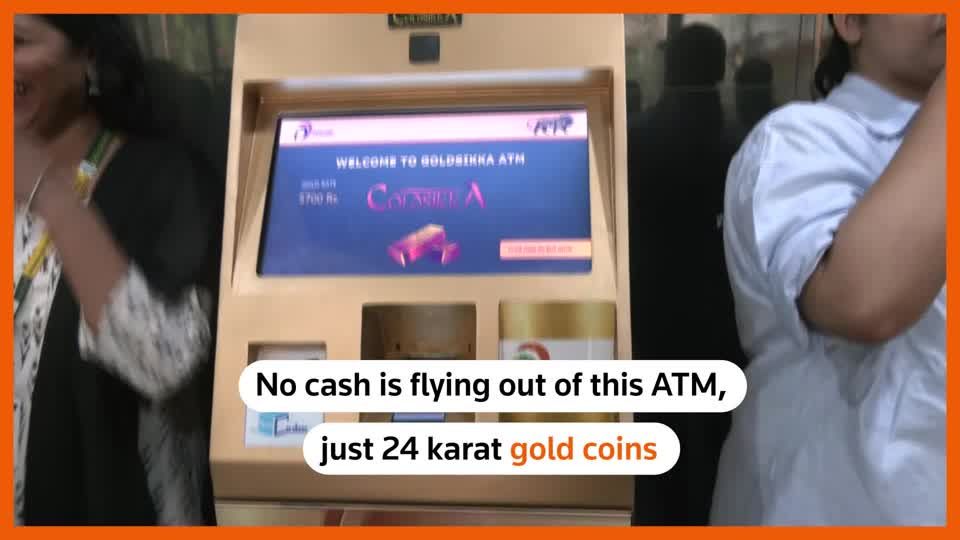 Gold coin-dispensing ATM opens in India | Reuters