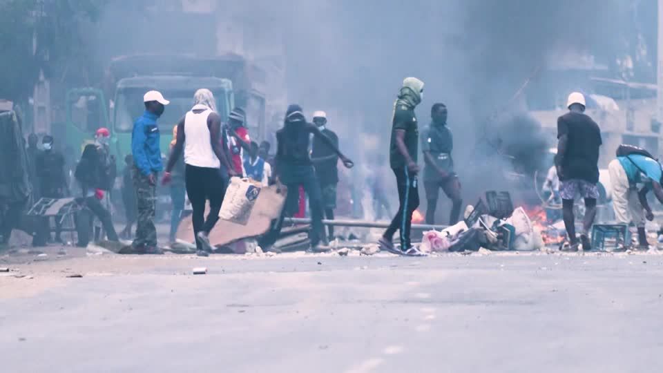 Senegal dissolves opposition party as protests persist | Reuters