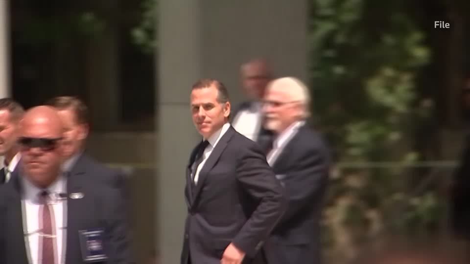 Ex-FBI informant charged with lying about Bidens | Reuters