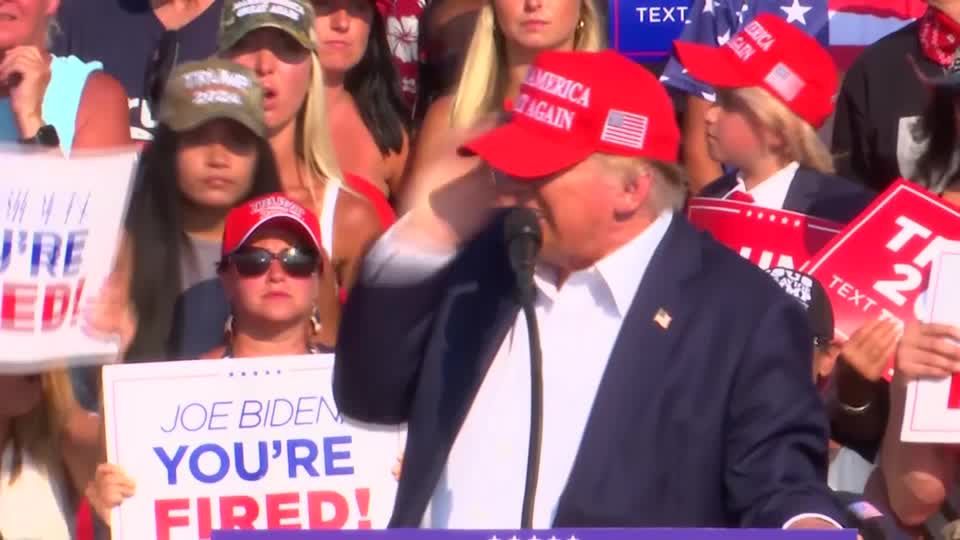 Trump shot in right ear at rally, source says shooter dead | Reuters
