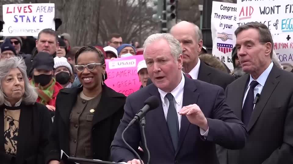 Protesters rally in Washington DC against Trump, Musk actions | Reuters