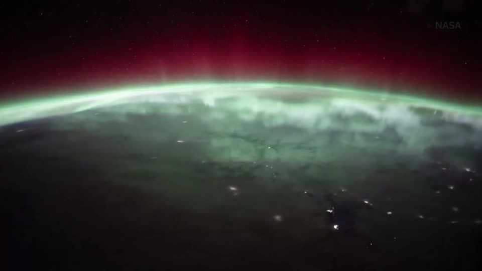 NASA captures video of glowing aurora from space station | Reuters