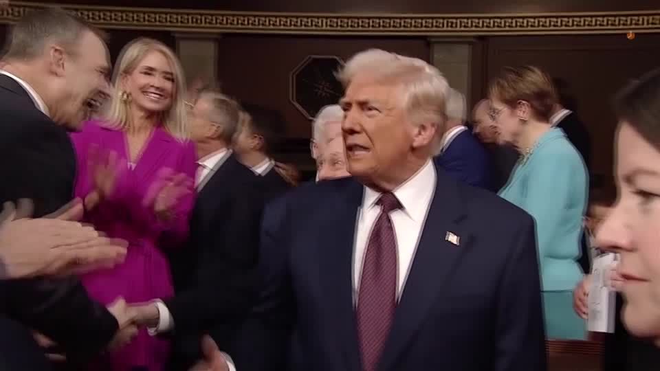 'This is not normal' sign yanked away as Trump arrives in Congress ...