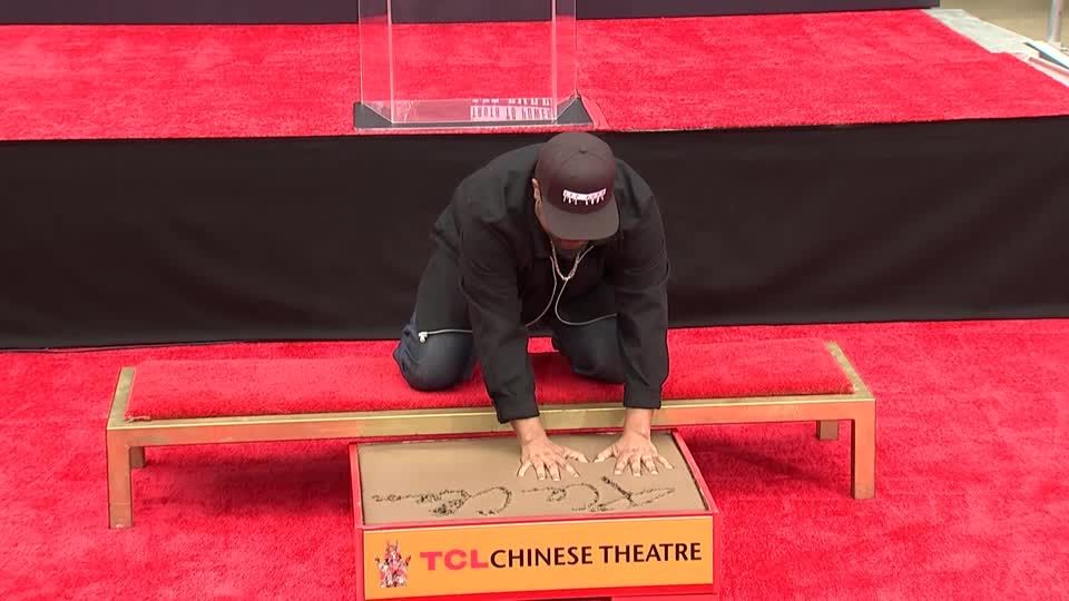 Rapper Ice Cube honored with hands and feet ceremony | Reuters