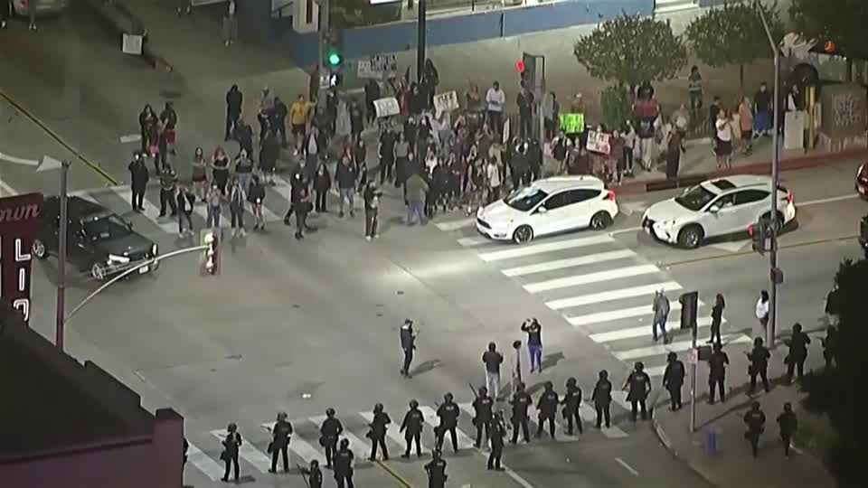 Protesters outside LA hotel after reports of ICE agents staying | Reuters