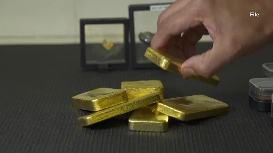 US gold futures hit record high after report of tariffs on gold bars ...