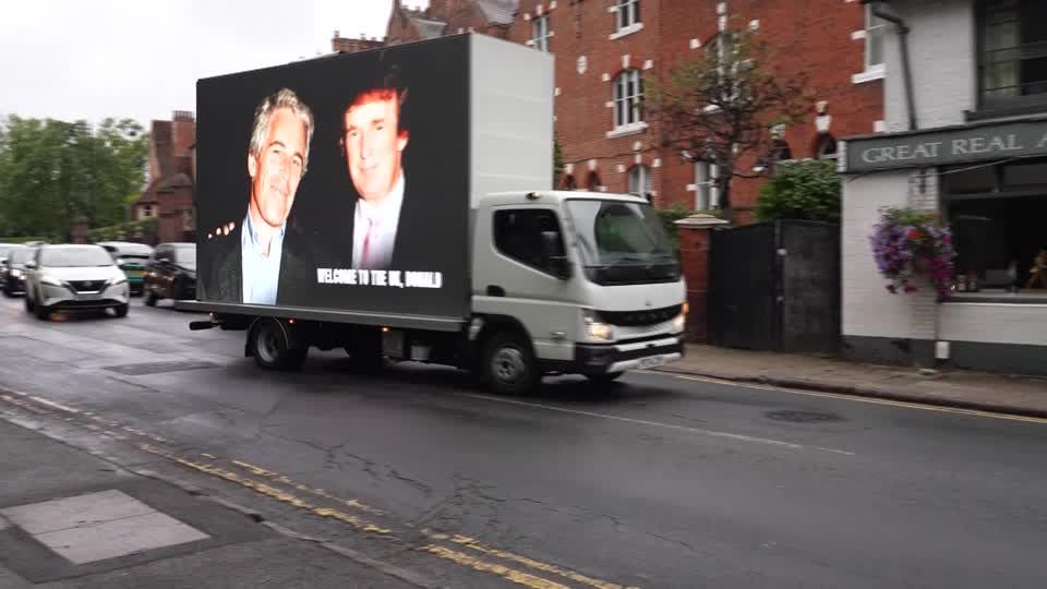 Van showing Trump-Epstein photo stopped by police in Windsor | Reuters