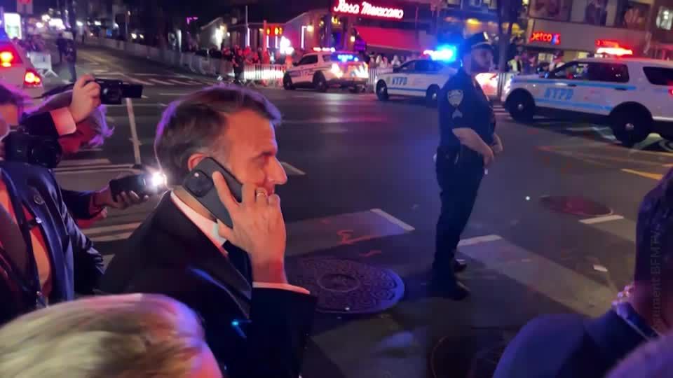 Macron phones Trump after being blocked by his motorcade route | Reuters