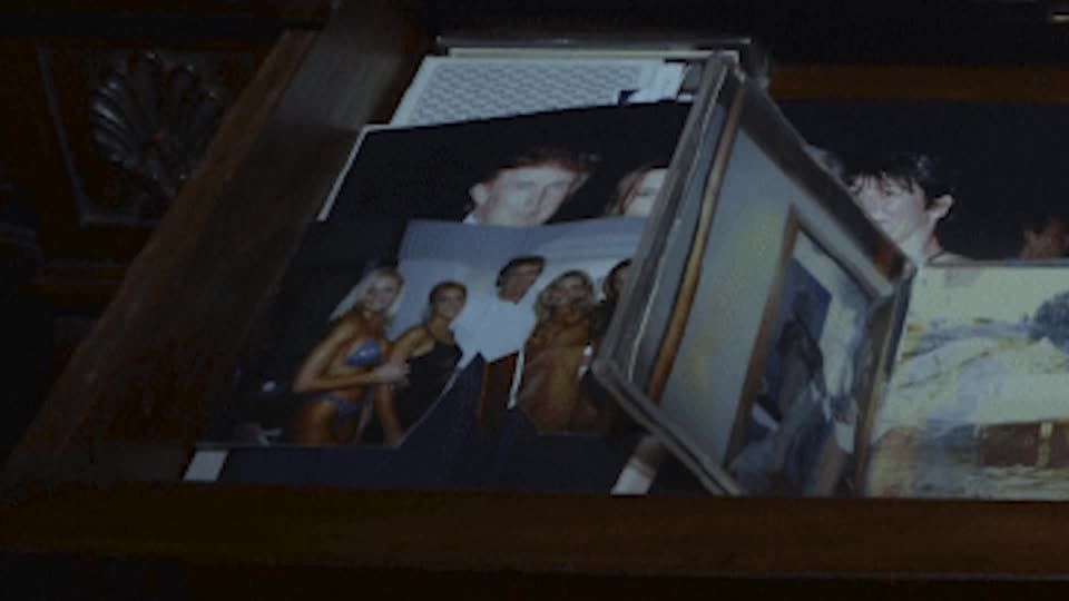 DOJ restores Trump photo to public database of Epstein files | Reuters