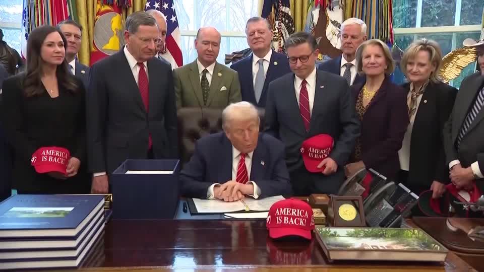 Trump signs spending bill that ends four-day government shutdown | Reuters
