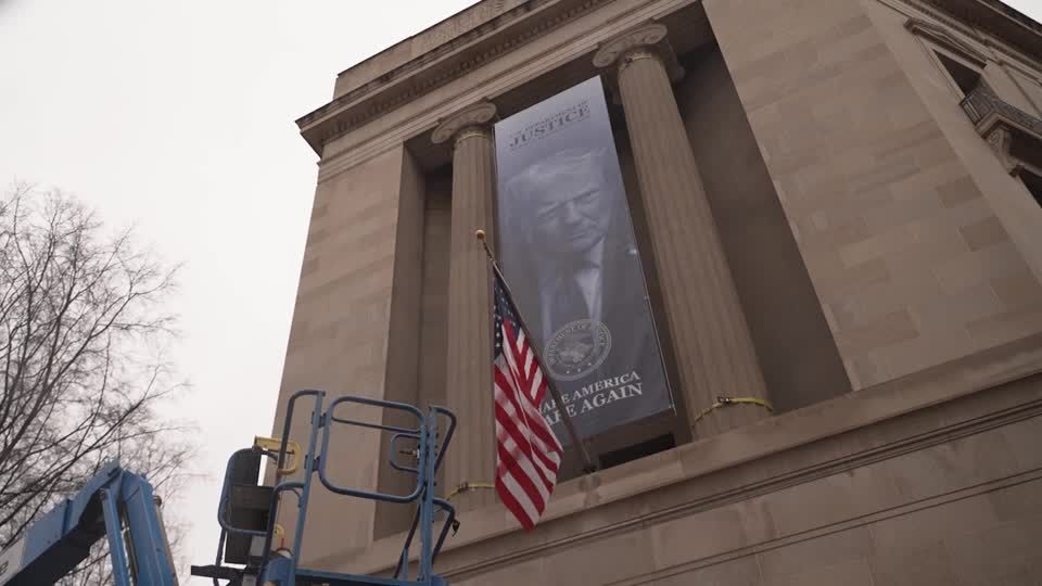 'Make America Safe Again': New Trump banner on DOJ building | Reuters