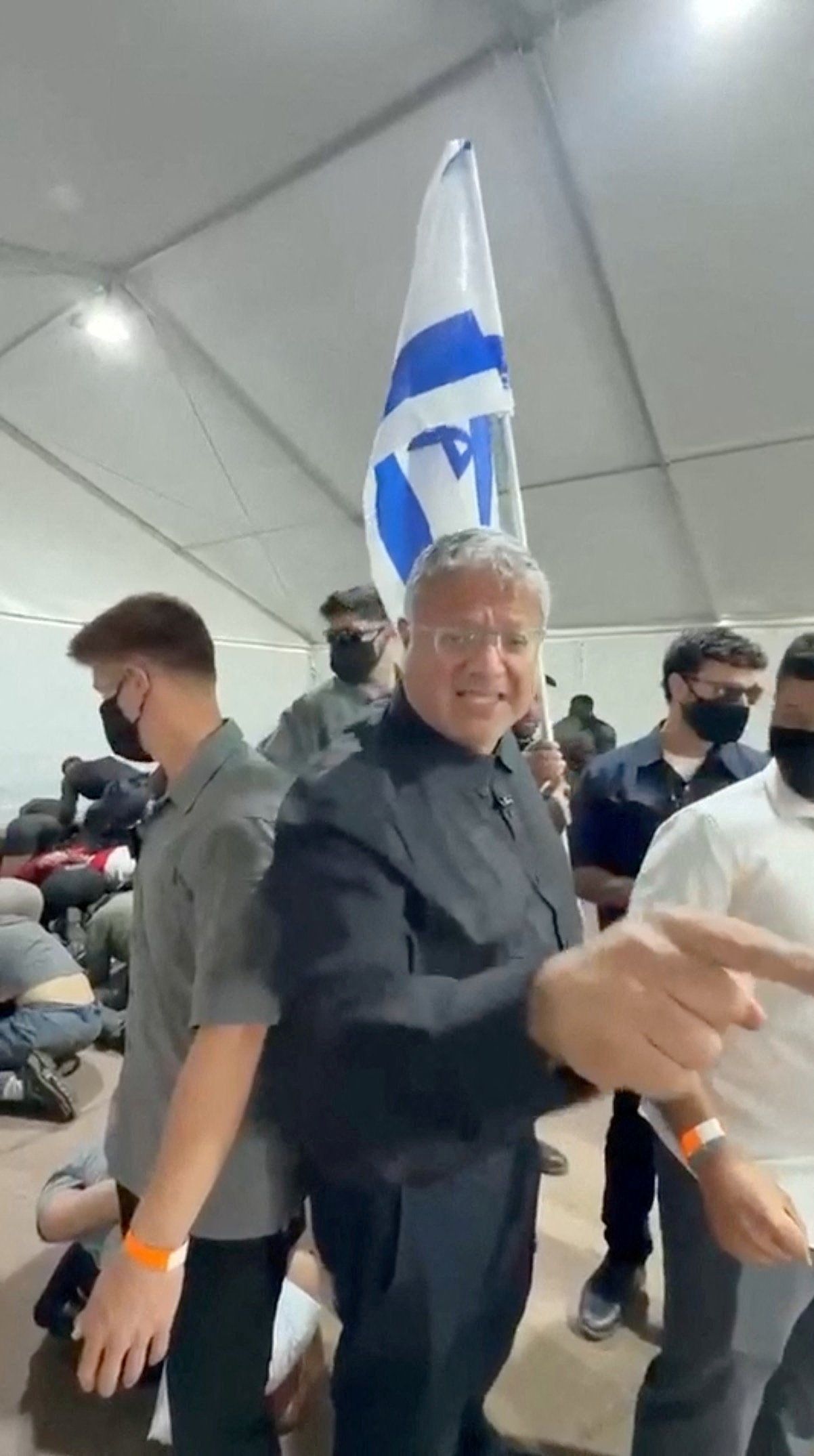 Footage appears to show Israel's Ben-Gvir taunting detained flotilla ...